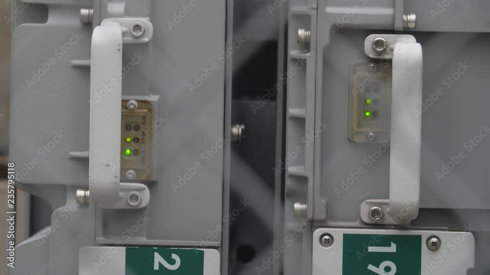 Detail of Remote Radio Unit or RRU with flashing lights. An RRU is a ...