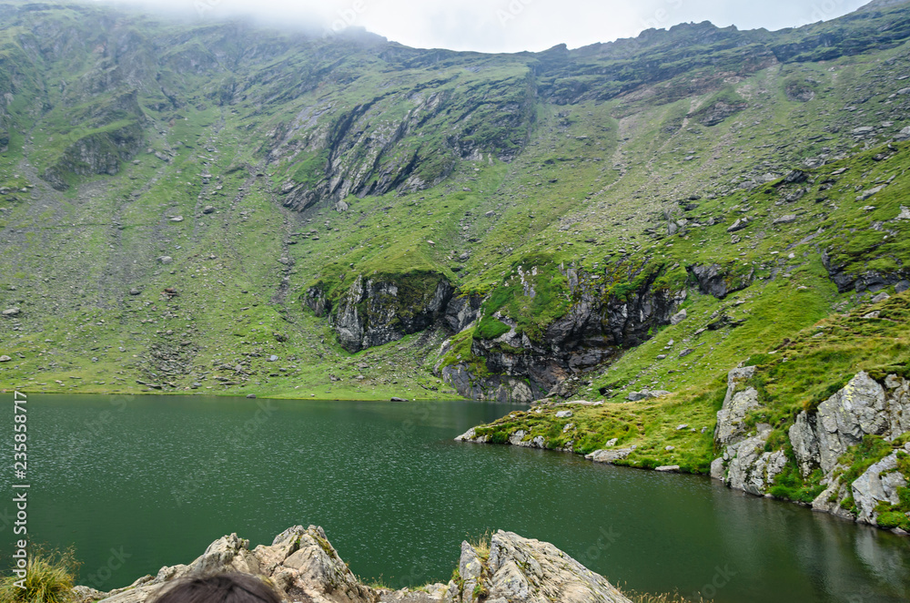 The glacier lake called Balea (Balea Lac) on the Transfagarasan road ...