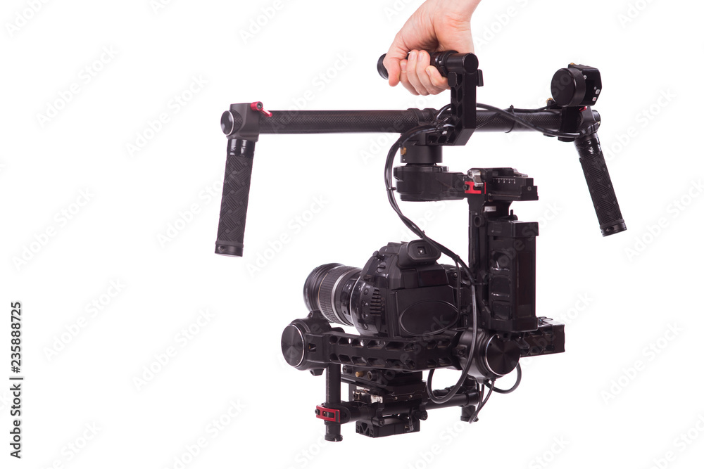 Man's hand holds system stabilization video camera and lens on steady ...