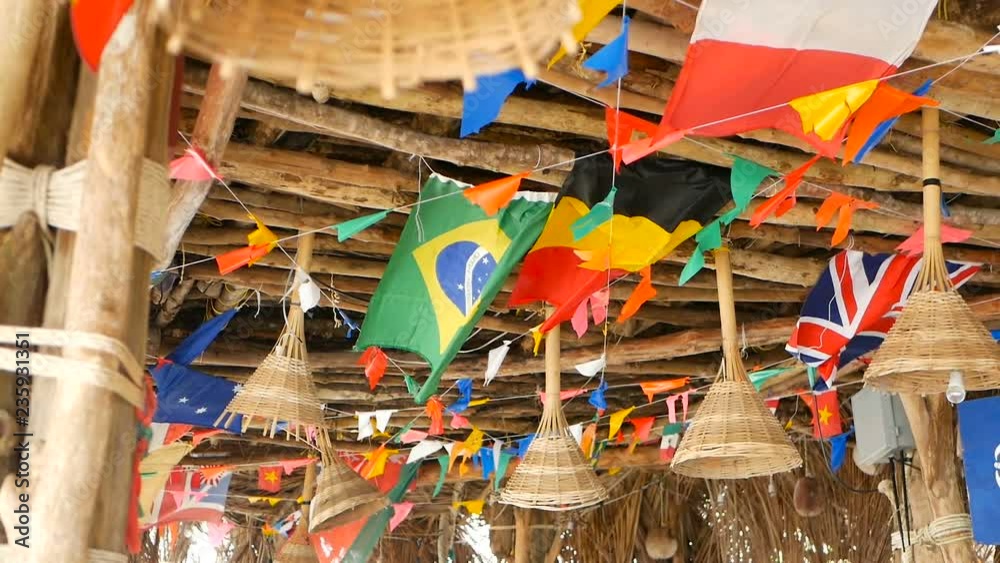 Stockvideo Decorative national flags of different countries hanging on ...
