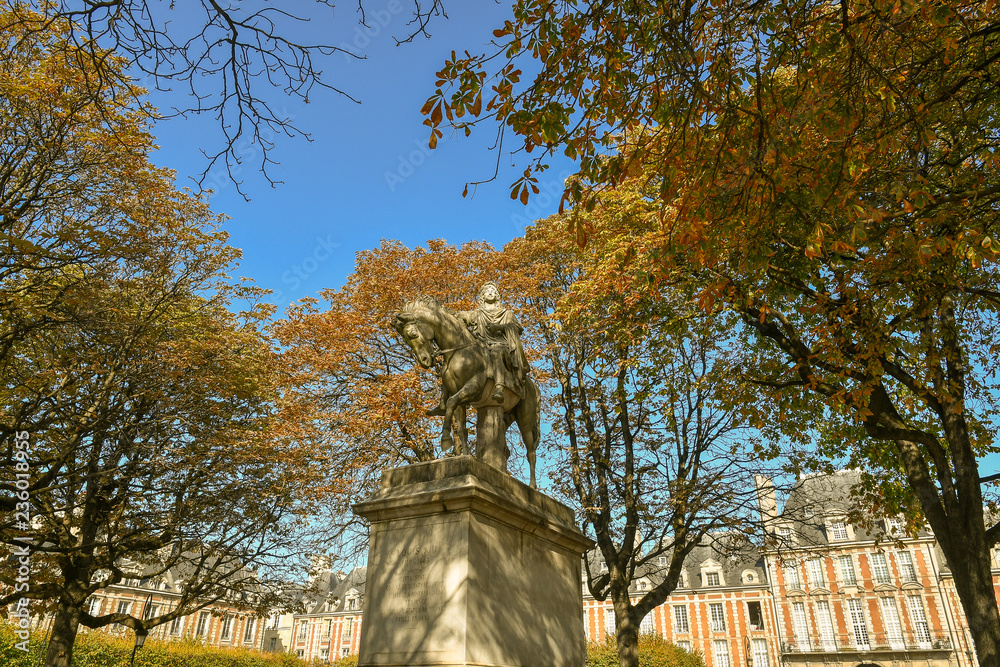 Equestrian statue of Louis XIII in the oldest Parisian square Place des ...