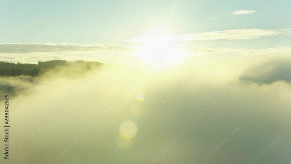 Aerial view of sunset flying by helicopter Stock Video | Adobe Stock