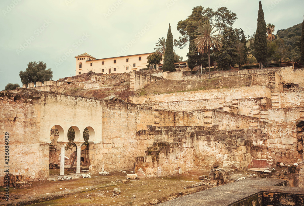 Stone arches and ruins of the fortified Moorish medieval city Medina al ...