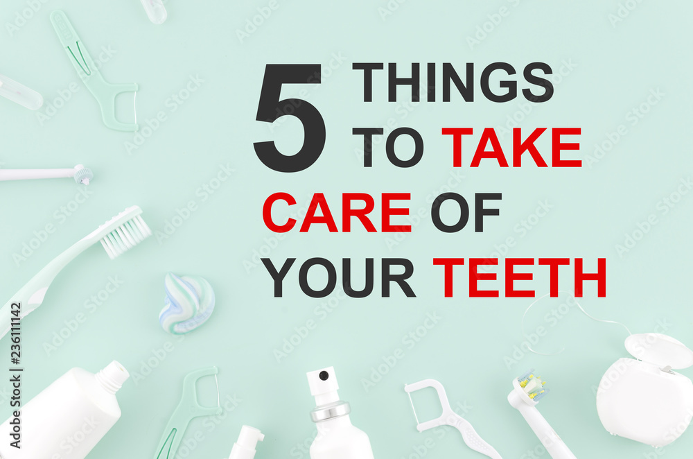 Tools for dental care: orthodontic brush, floss, toothpaste. Flat lay ...