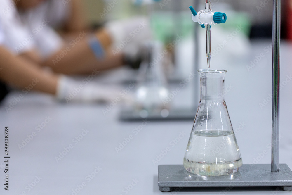Titration technique in the laboratory. Stock Photo | Adobe Stock