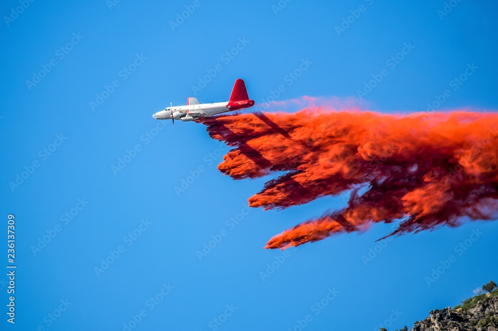 Slurry bomber fights wildfires. Aerial Firefighting in Utah Stock Photo ...
