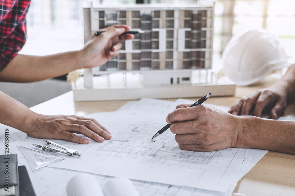 Architecture Engineer Teamwork Meeting, Drawing and working for ...