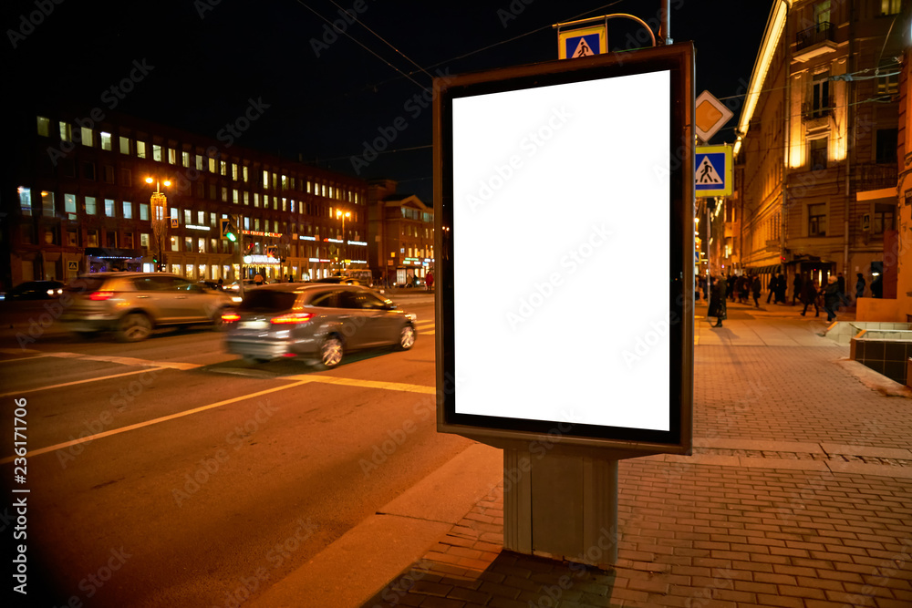 Billboard on the street Outdoor Advertising glows at night. Layout for ...