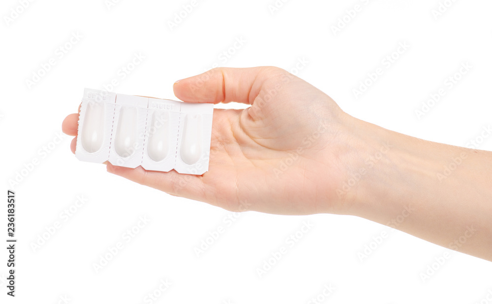 Suppositories in hand medicine on a white background. Isolation Stock ...