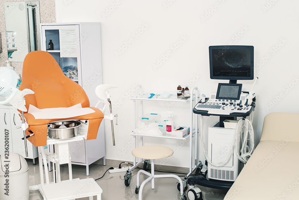 Gynecological Cabinet With Chair And Other Medical Equipment Room In ...