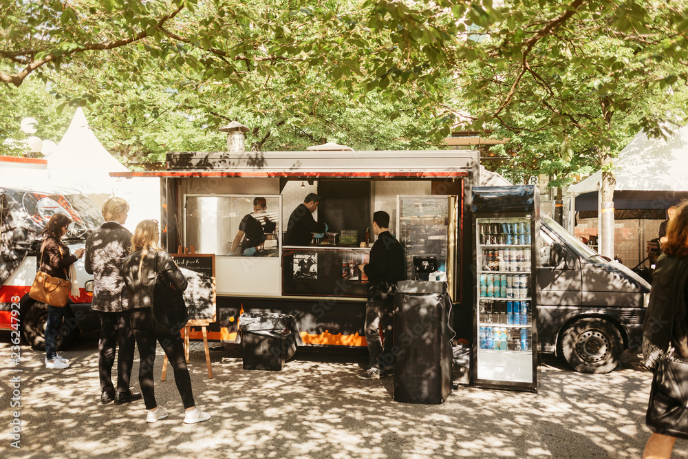Customers waiting at food truck for their burgers Stock Photo | Adobe Stock