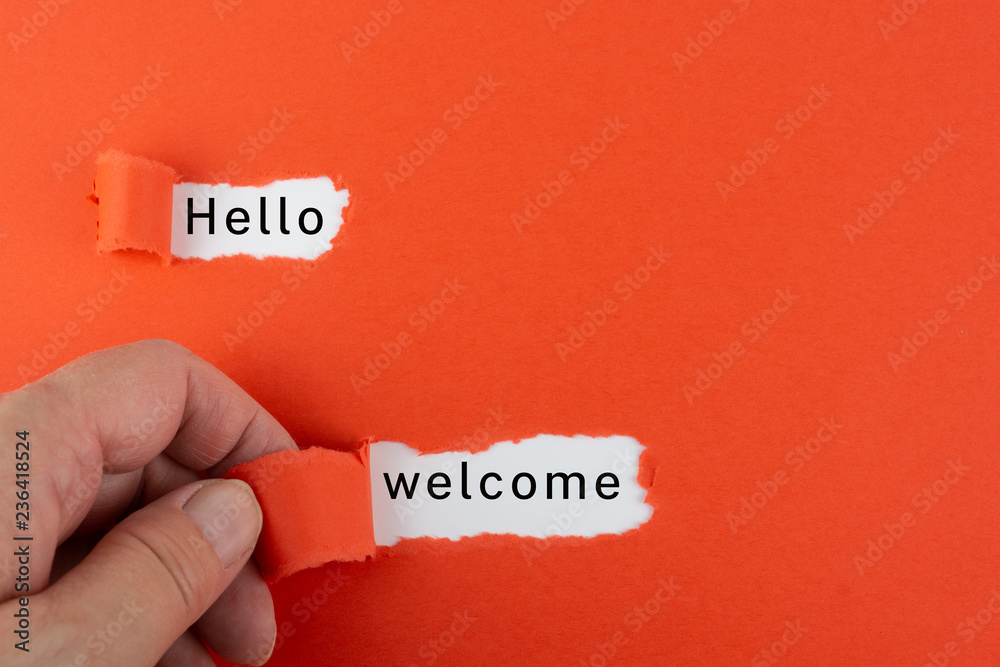 Torn paper with the words hello and welcome underneath Stock Photo ...