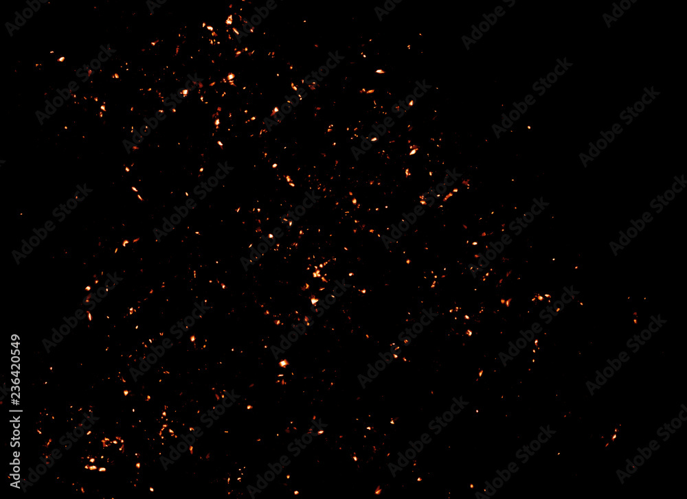 Fire sparks came from campfire isolated on textire black background for ...