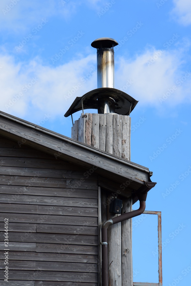 Schornstein aus Holz mit Stülphaube Stock Photo | Adobe Stock