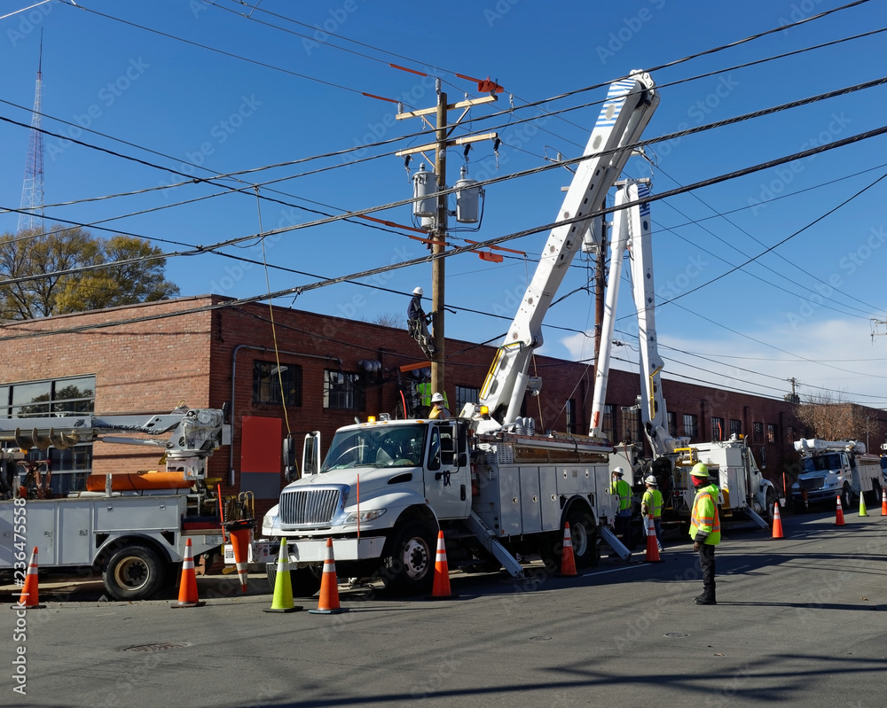 Electrical activity surrounding urban power lines. Stock Photo | Adobe ...