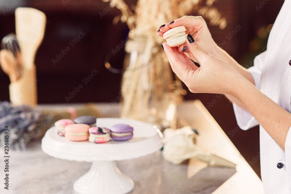 The confectioner joins the parts of the macarons with each other using ...