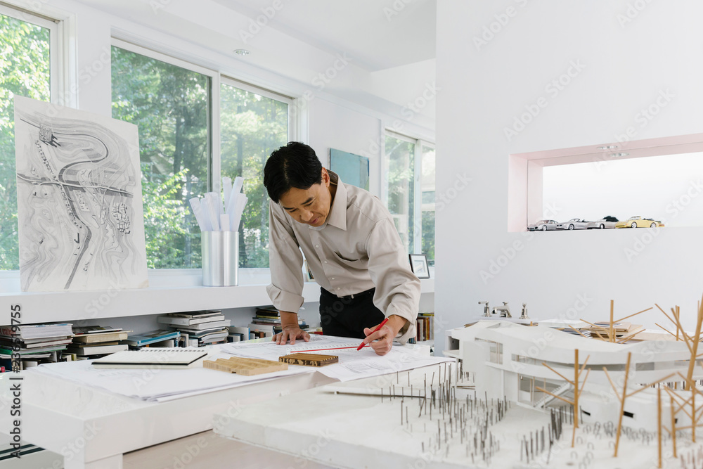 Architect working in Office Stock Photo | Adobe Stock