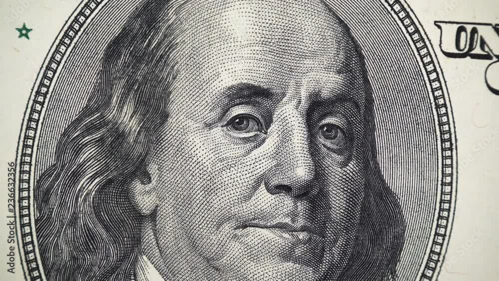 Benjamin Franklin face on old US 100 dollar bill rotating, money close ...
