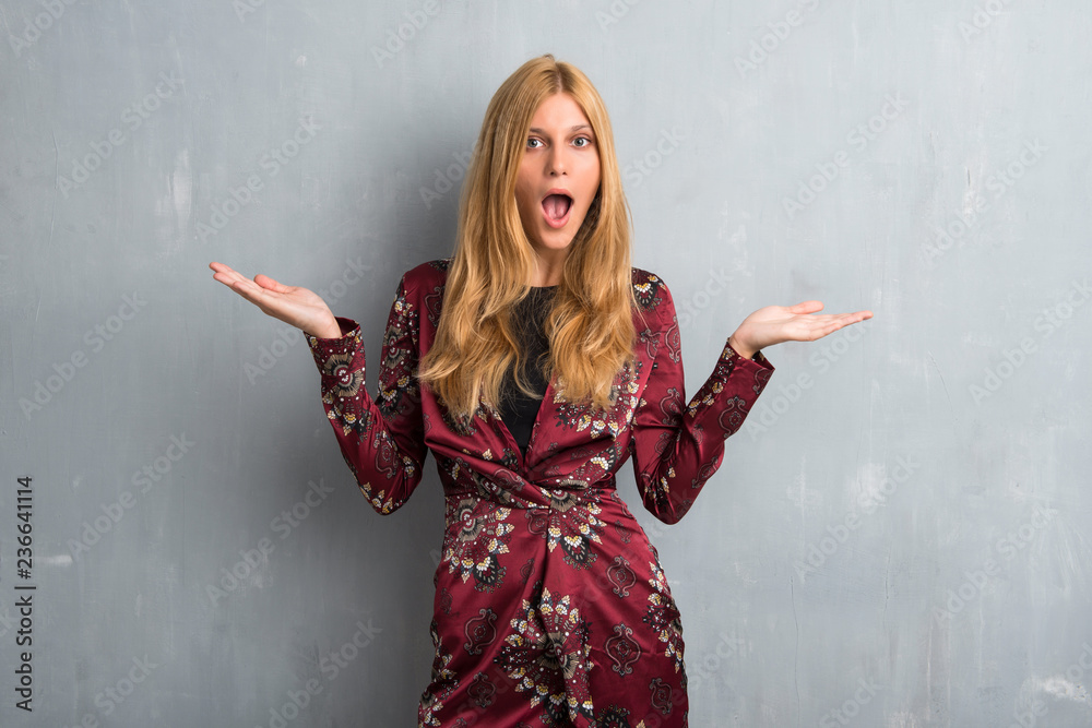 Blonde woman with surprise and shocked facial expression. Mouth open ...