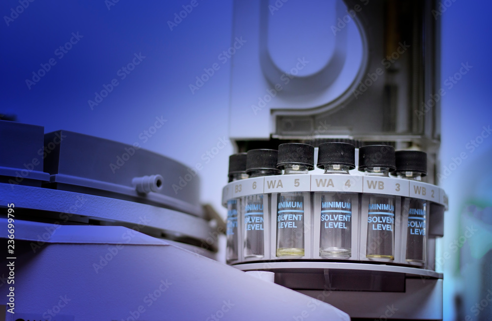 Quality Control Laboratory medicine by equipment. Vials on autosampler ...