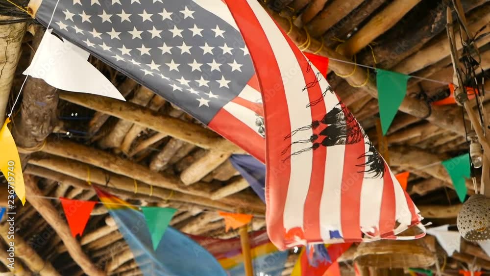 Decorative national flags of different countries hanging on strings in ...