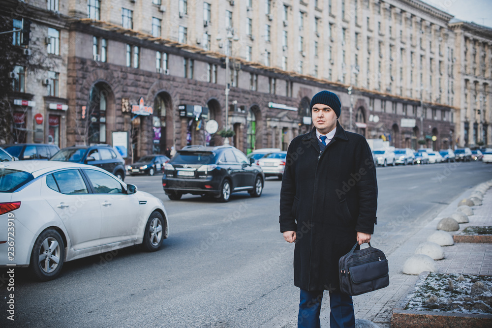 Worried man with overweight at city streets. Life of businessman or ...