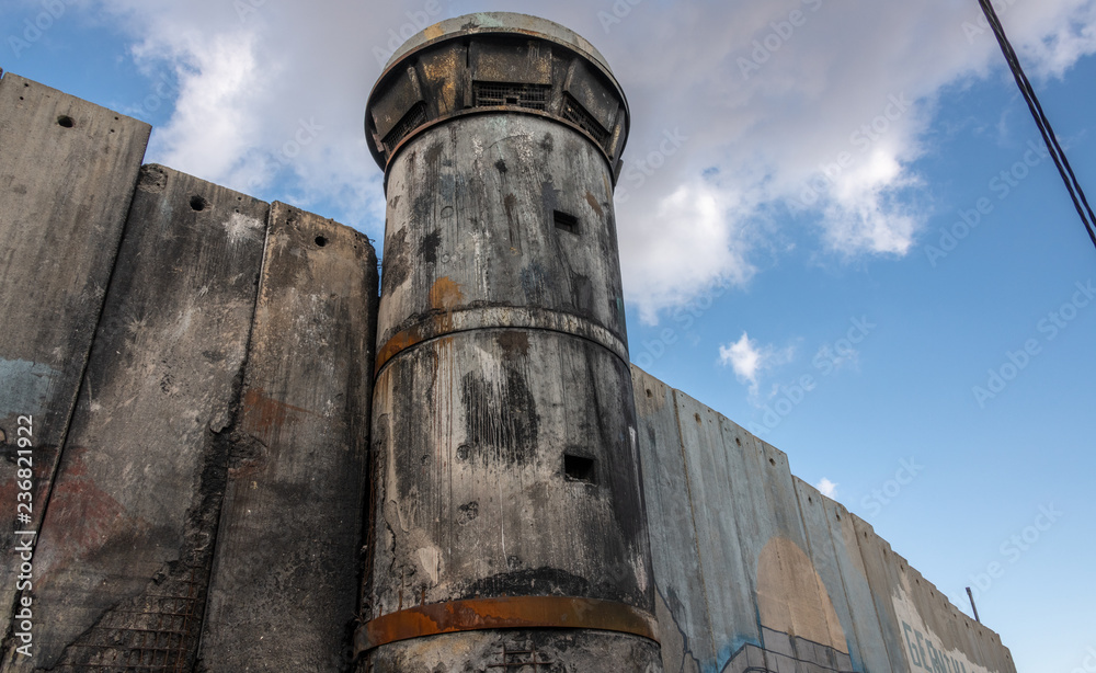 Guard tower and border wall between Israel and Palestine in Bethlehem ...