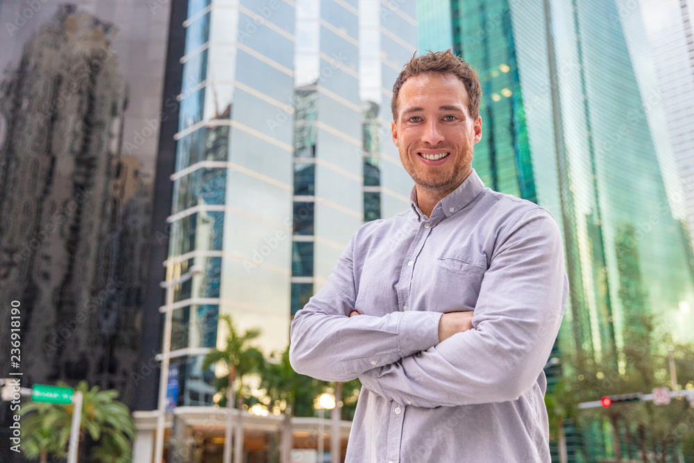 Businessman portrait young smiling business man confident in front of ...