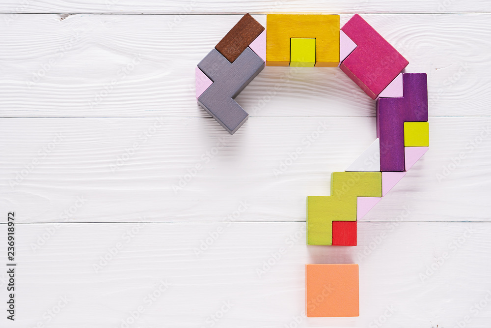 Question mark made of colorful wooden blocks. Stock Photo | Adobe Stock