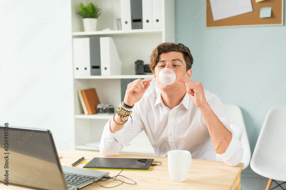 Joke, office, humor, people concept - handsome man chewing gum and ...