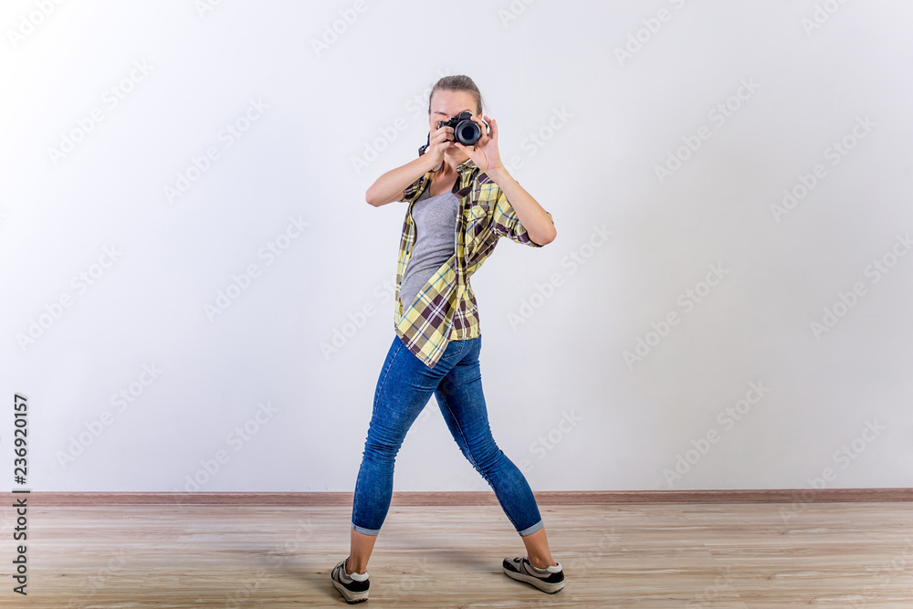 different photographer poses: bending, squatting, lying down Stock ...