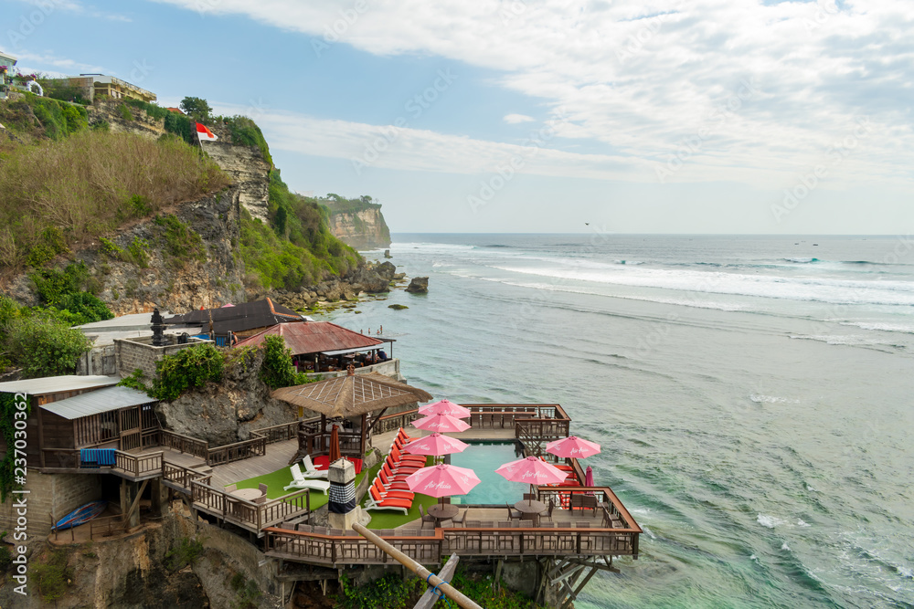 Suluban Beach- the surfing paradise, view of the sea with surfers all ...