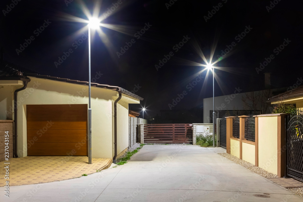 small village street with modern LED streetlights at night Stock Photo ...