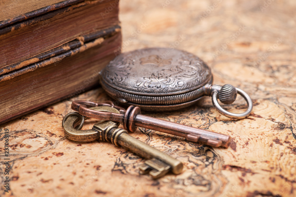 Panta rhei concept: Antique pocket watch, vintage keys and pile of old ...
