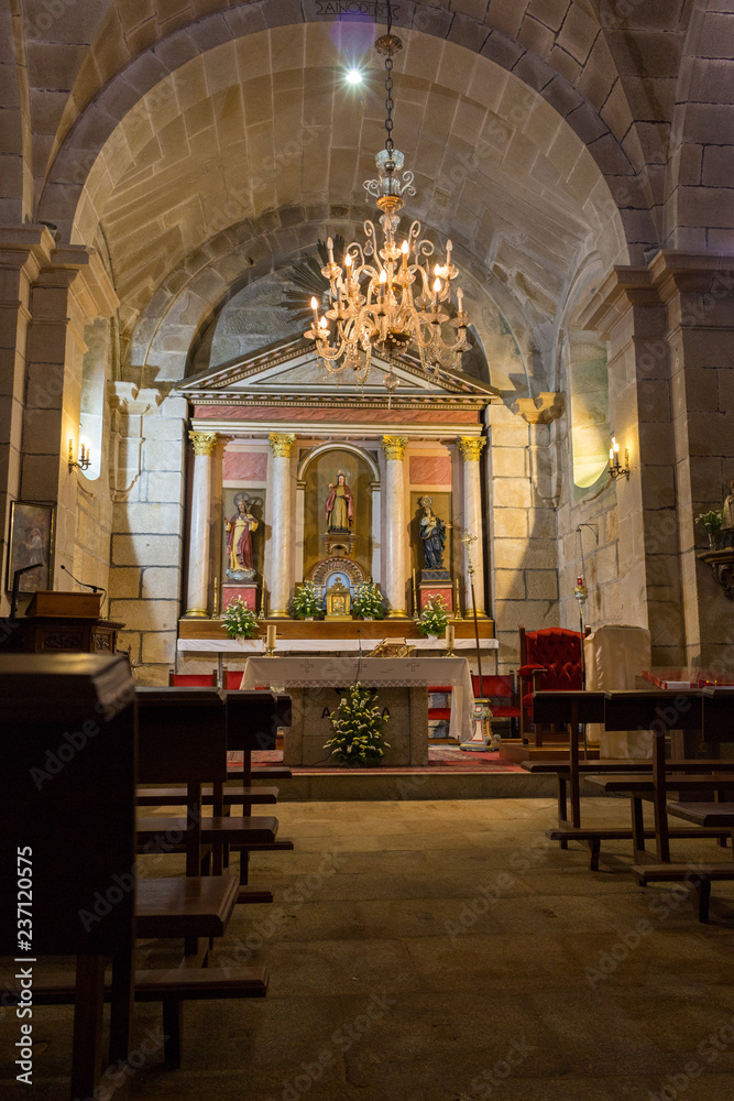 Empty catholic cathedral. Church altar with chandelier, saint ...