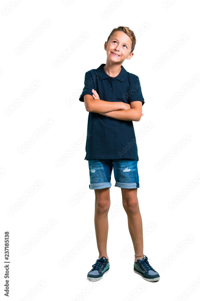 Full body of Little boy stand and looking up on white background Stock ...