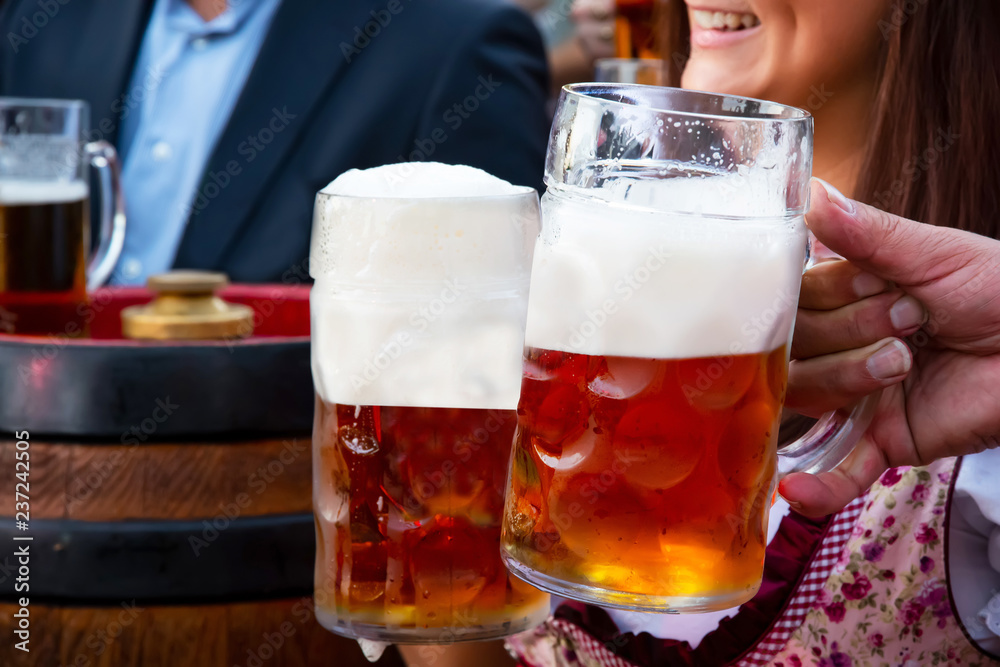 Mit Massbier anstossen Stock Photo | Adobe Stock