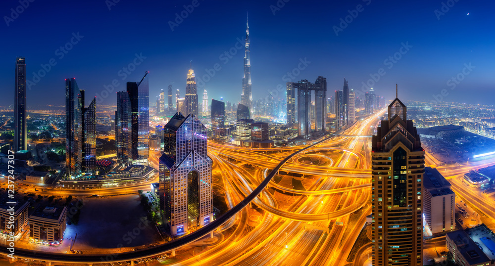 Dubai skyline at night, panoramic aerial top view to downtown city ...