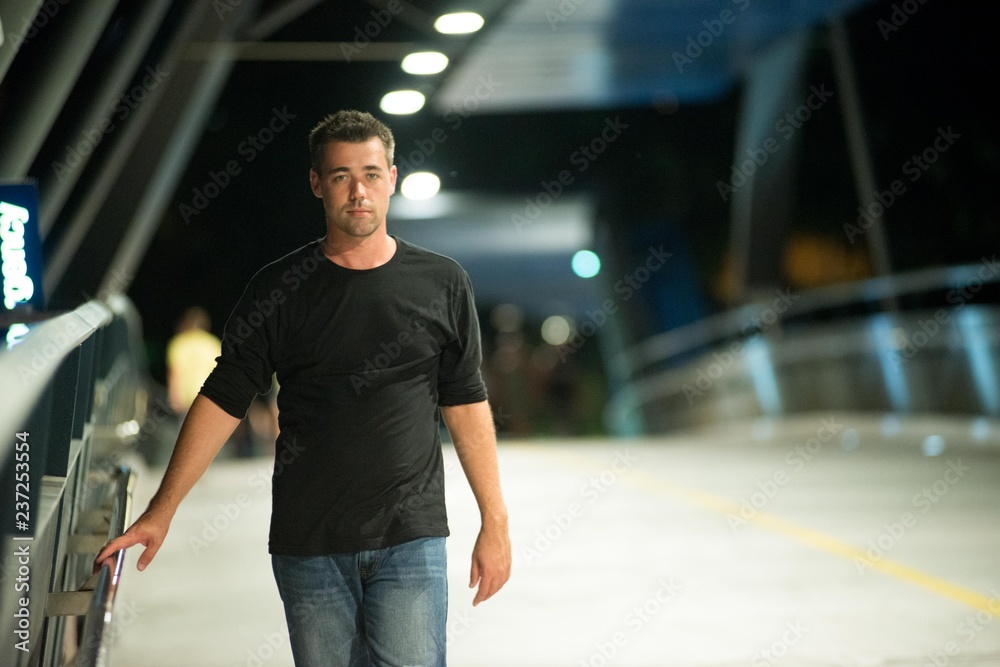Australian man poses for picture in Brisbane, Australia. Brisbane is ...