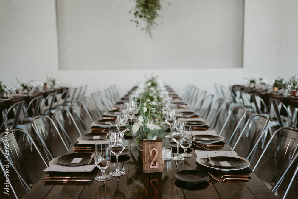 Foto de Long harvest tables with simple greenery and copper details in ...