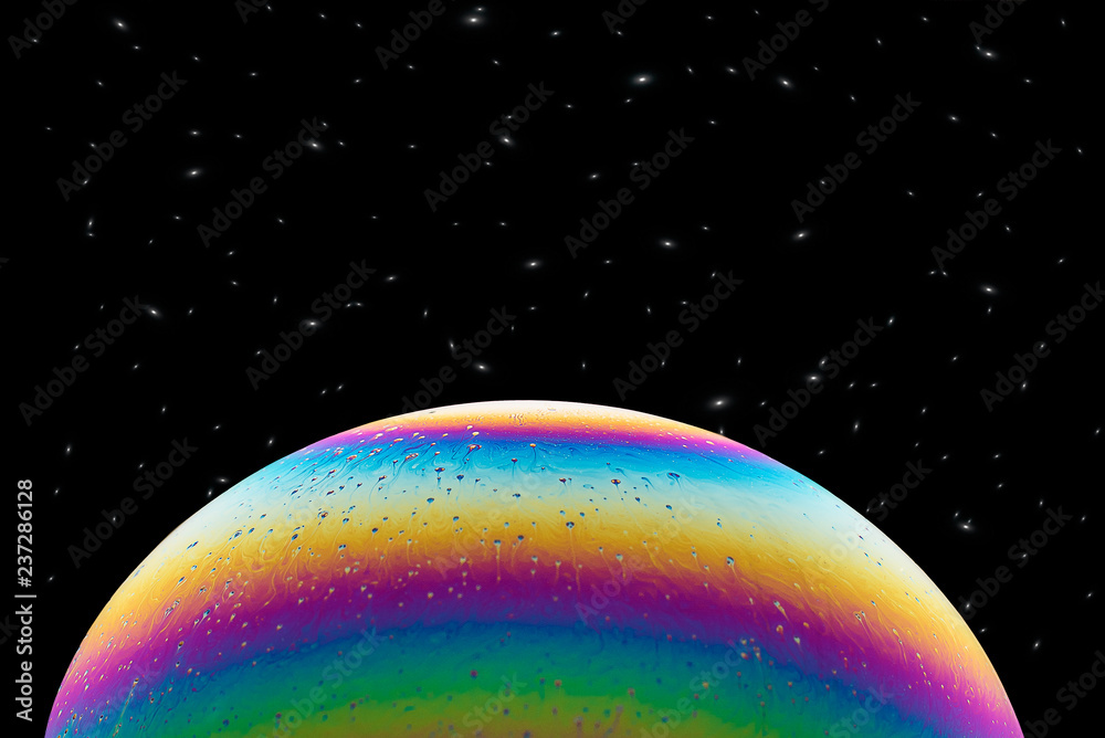 Rainbow Colored Semi Circle Soap Bubble / Planet in Space Stock Photo ...