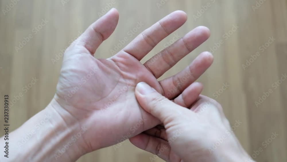 Hand of man pain trigger point with finger lock from office Syndrome ...