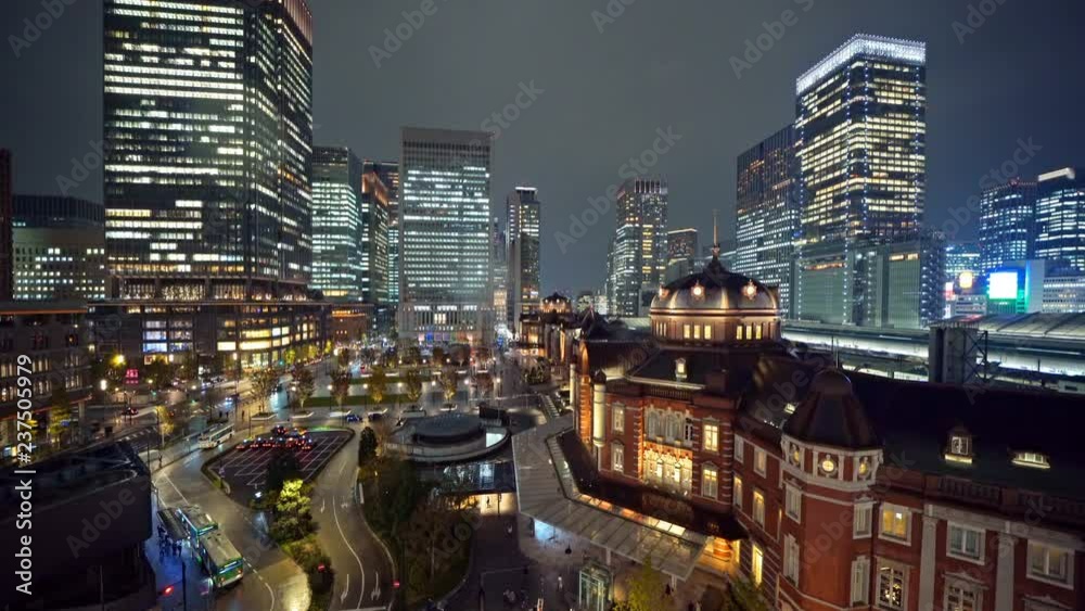 Tokyo railway station with high rise buildings. Downtown and financial ...