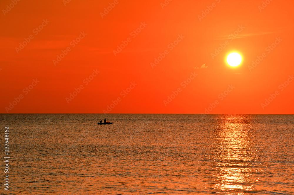 Fishermen at the South China Sea by stunning sunset. Pulau Tioman ...