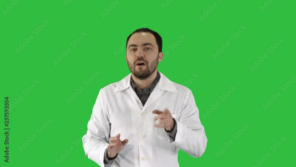 Friendly male medicine therapeutist doctor walking and talking looking ...