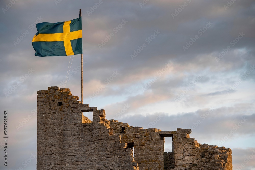 Swedish flag on medieval city wall, Unesco World Heritage Site, Visby ...
