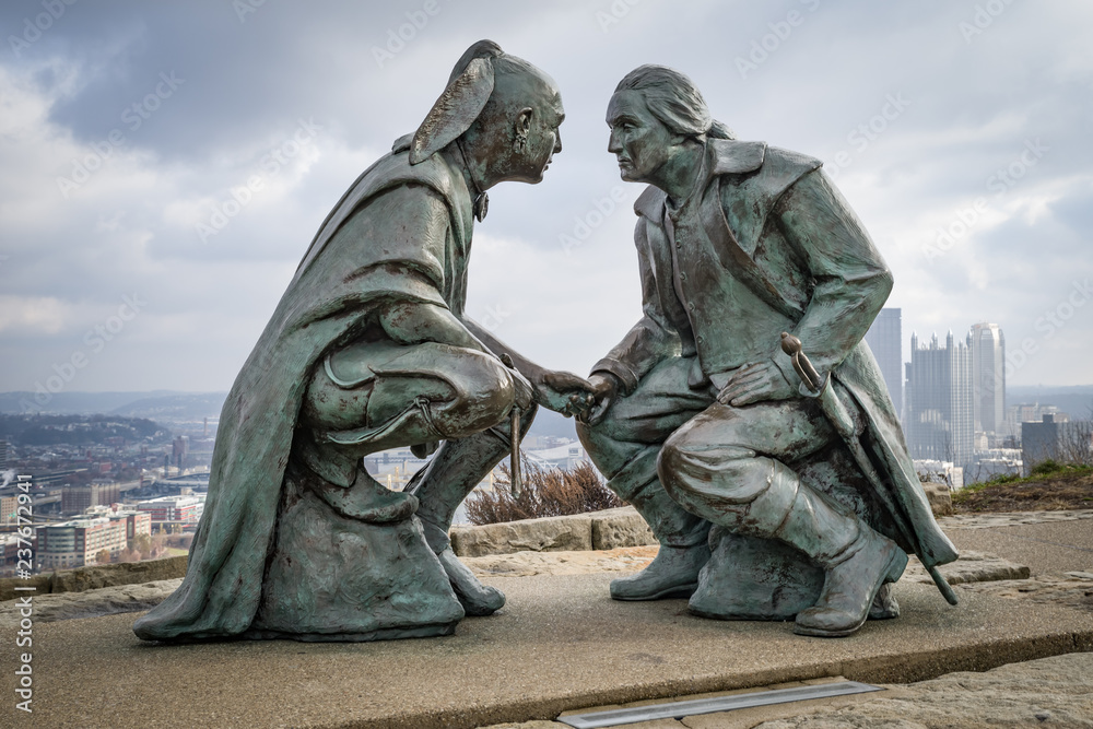 The bronze depicts George Washington and the Seneca leader Guyasuta ...
