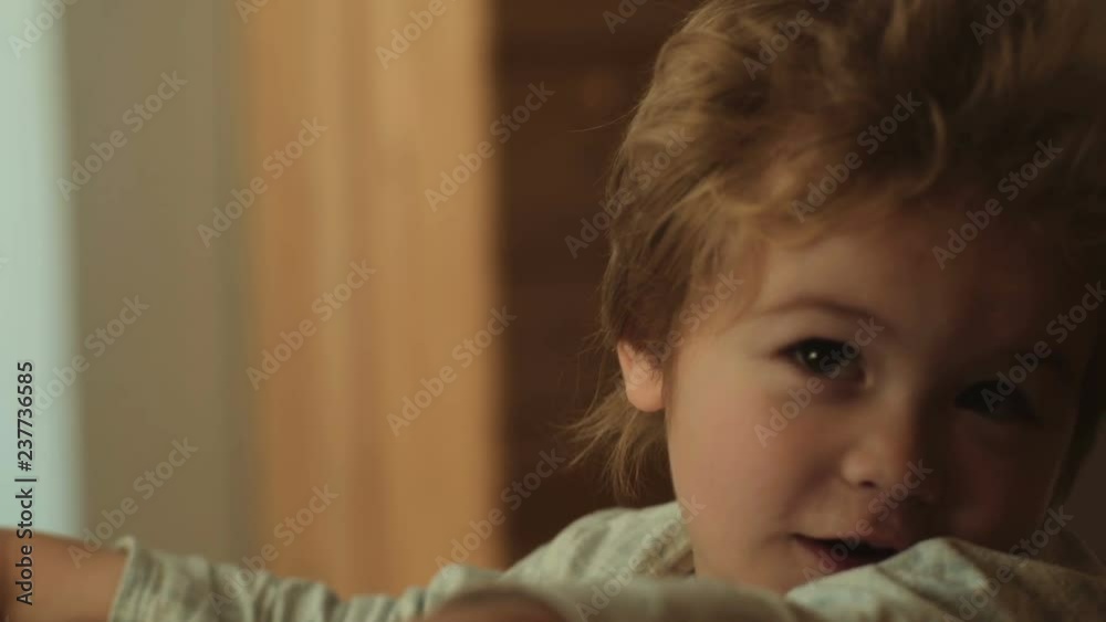 Yucky emotion of childish disgust. Little boy shows a mock disagreement ...