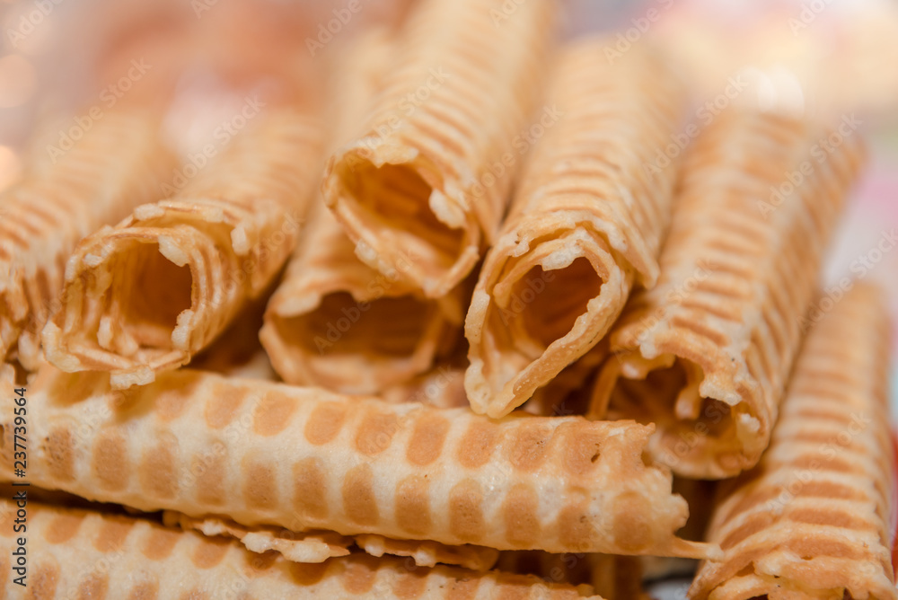 Waffles background. Waffles texture. A lot of waffles on the table ...