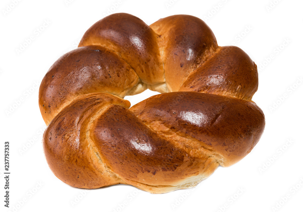 Round challah bread with a hole inside the isolate on a white ...